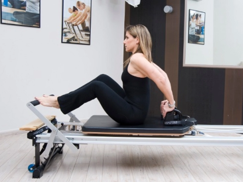 Pilates Stomach Massage Hands Back on the Reformer - MBS Pilates