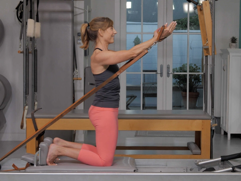Pilates Arm Circles Exercise on the Reformer - MBS Pilates