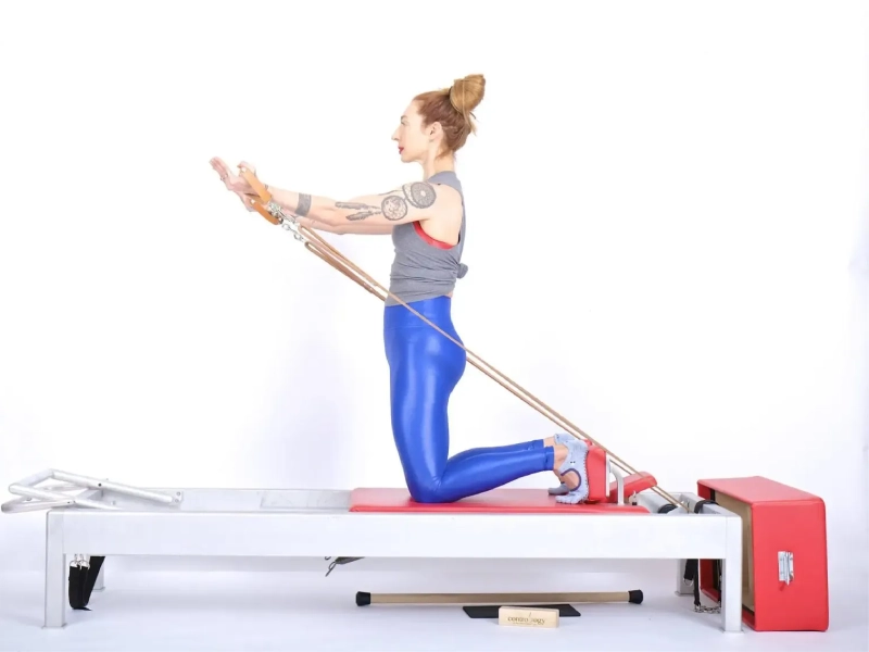 Pilates Arm Circles Exercise on the Reformer - MBS Pilates